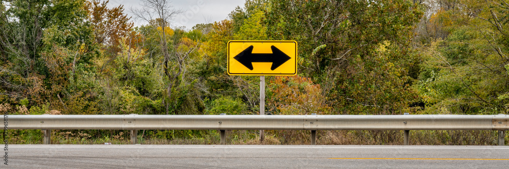 Double arrow traffic sign Stock Photo | Adobe Stock
