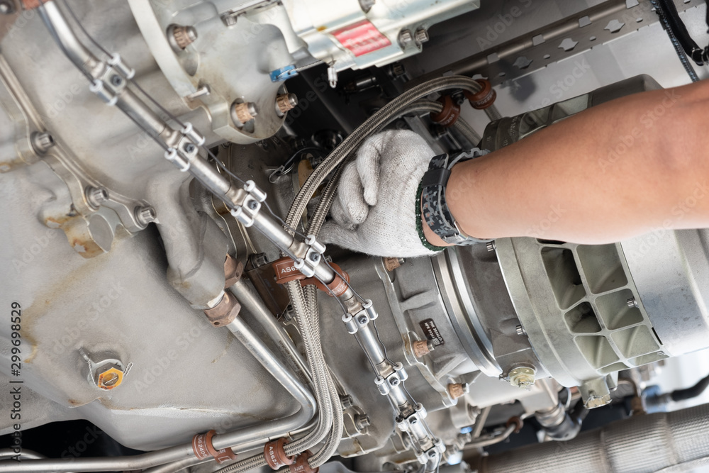Gas turbine engine close up during maintenance when airplane park at ...