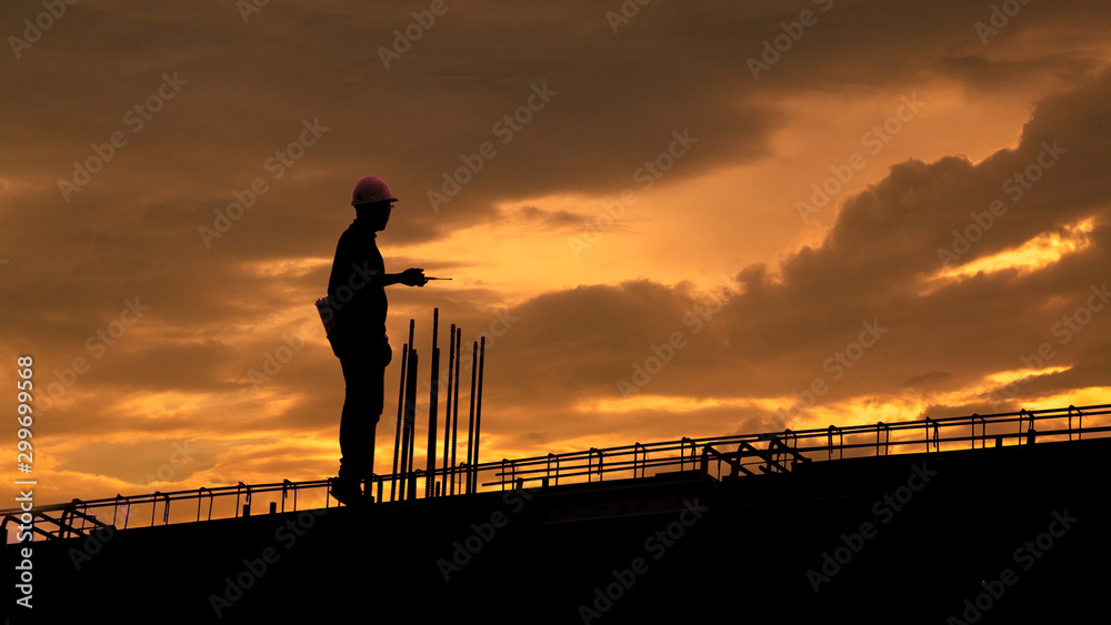 Construction worker using CB radio on a construction site,for ...