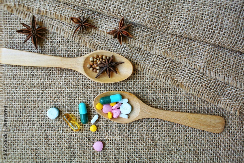 Tablets on a sackcloth background.Paracetamol, Antibiotics ...