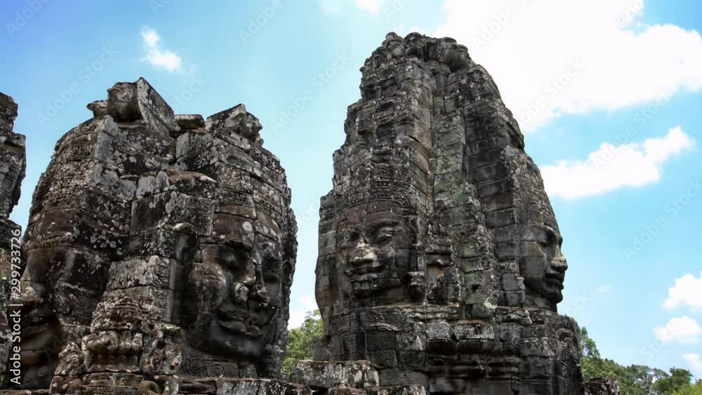 4K, Face towers depicting Bodhisattva Avalokiteshvara. Smiling faces ...