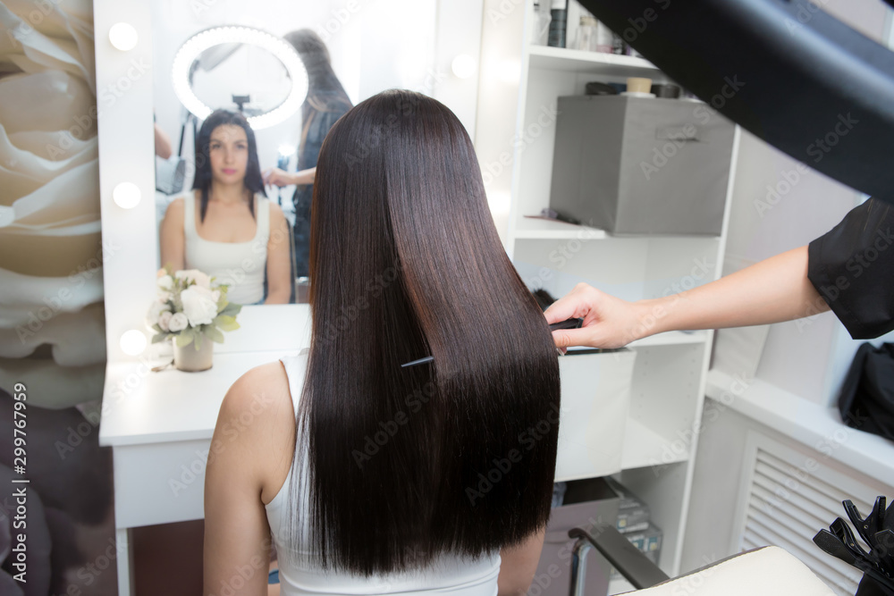 Saturated healthy shiny hair after keratin recovery. The concept of ...
