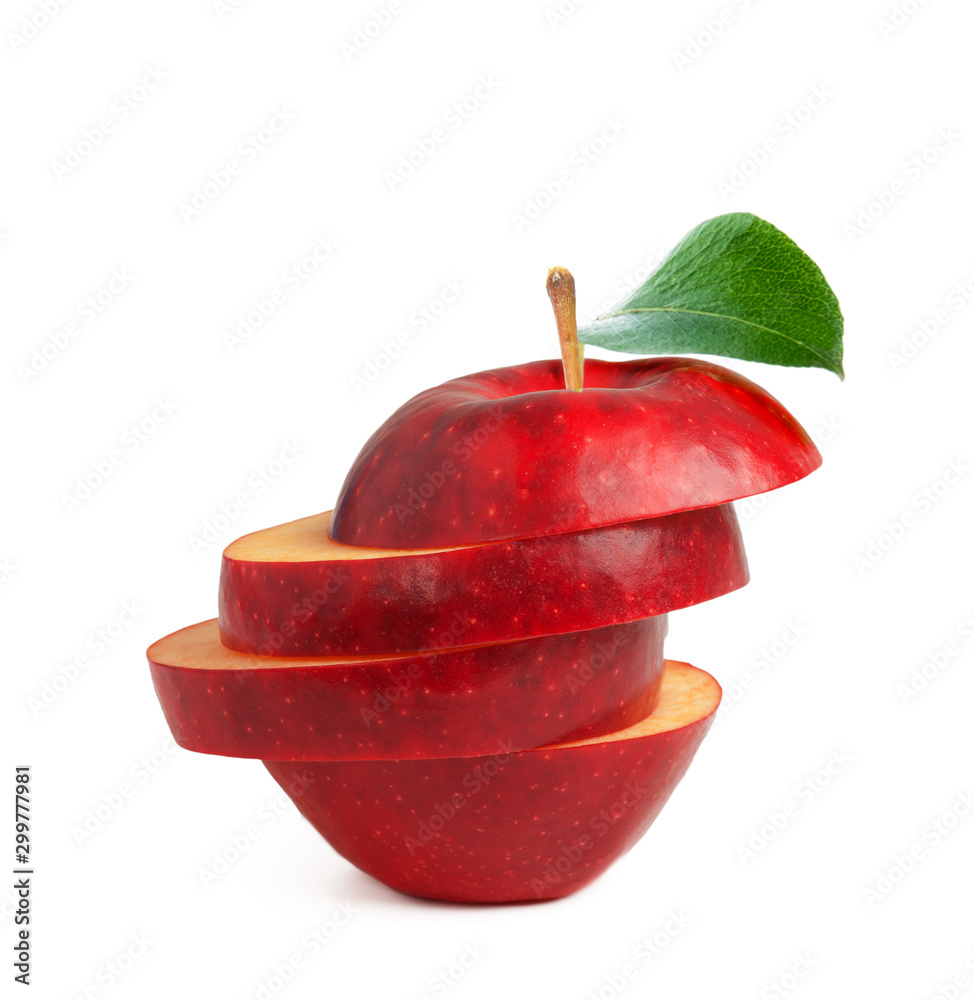 red apple with a green leaf cut into round slices isolated on white ...