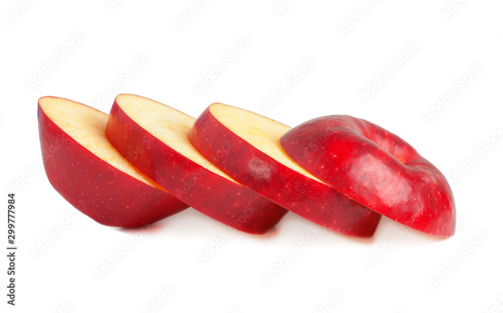 red apple is cut into round slices. side view isolated on a white ...