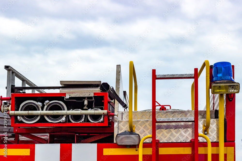 Fire engine, side view, neatly folded equipment inside the fire engine ...