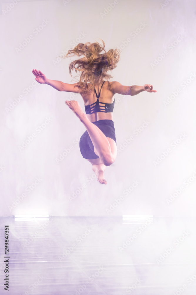 Young modern dancer dancing in the studio. Sport, dancing and urban ...