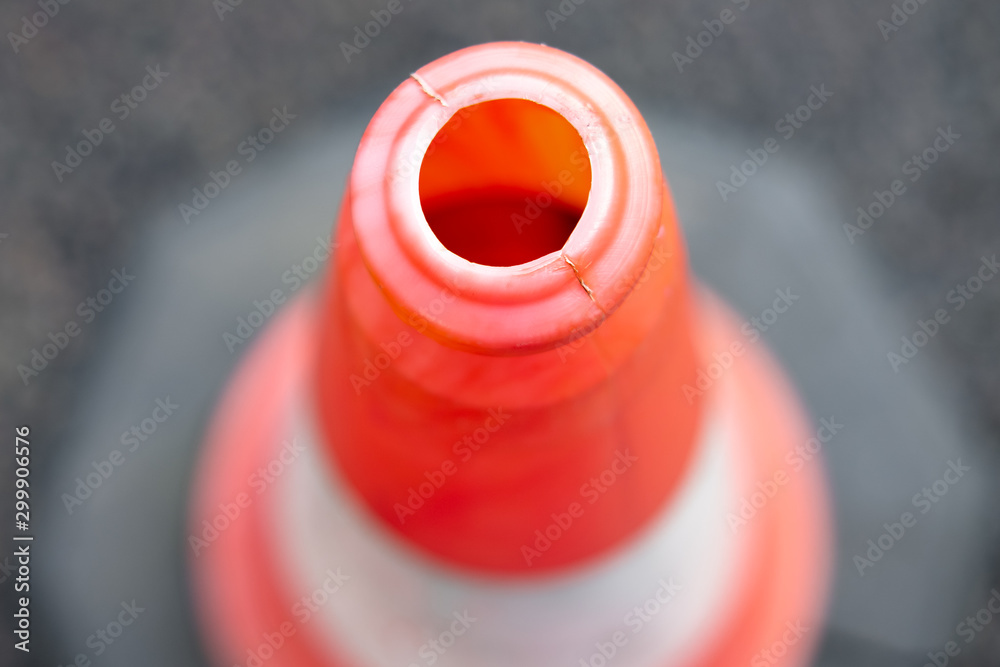Shallow focus, isolated image of a large plastic traffic cone seen at ...