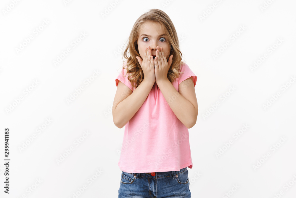Amazed speechless cute blond little girl, teenage kid gasping, cover ...