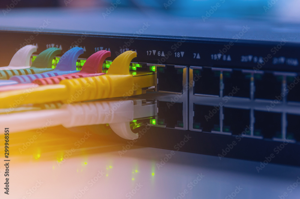 Network panel, switch and cable in data center Stock Photo | Adobe Stock
