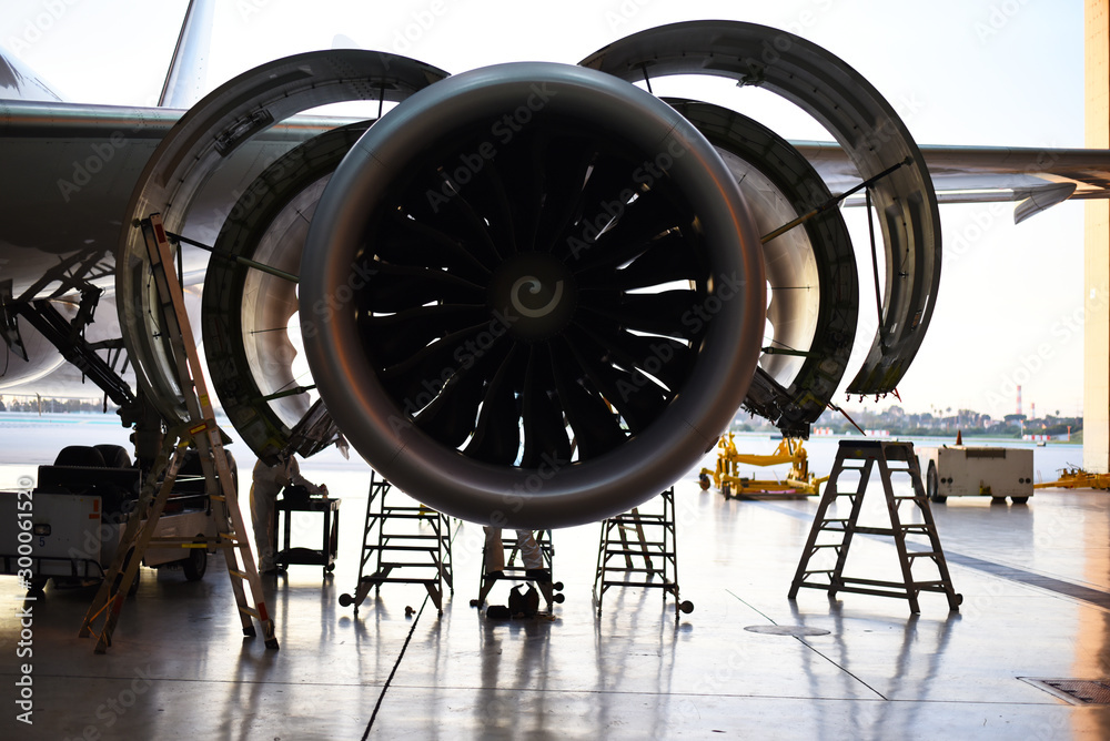 Open jet engine on a widebody commercial airplane. Stock Photo | Adobe ...