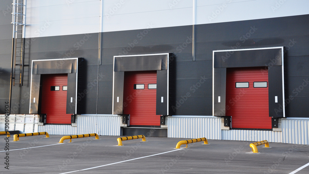 Empty loading dock of a large warehouse. Modern warehouse complex ...
