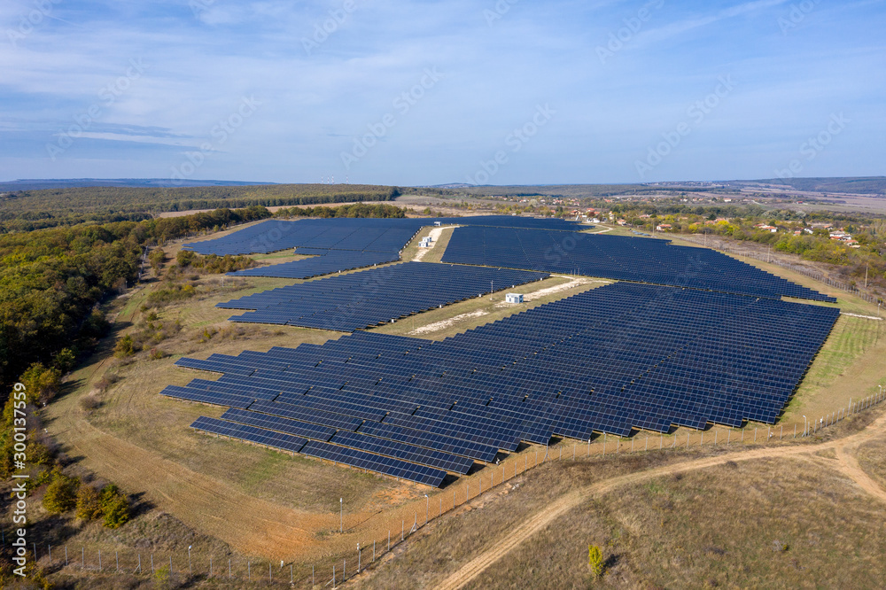Aerial view of industrial photostatic solar units panels. Photovoltaic ...