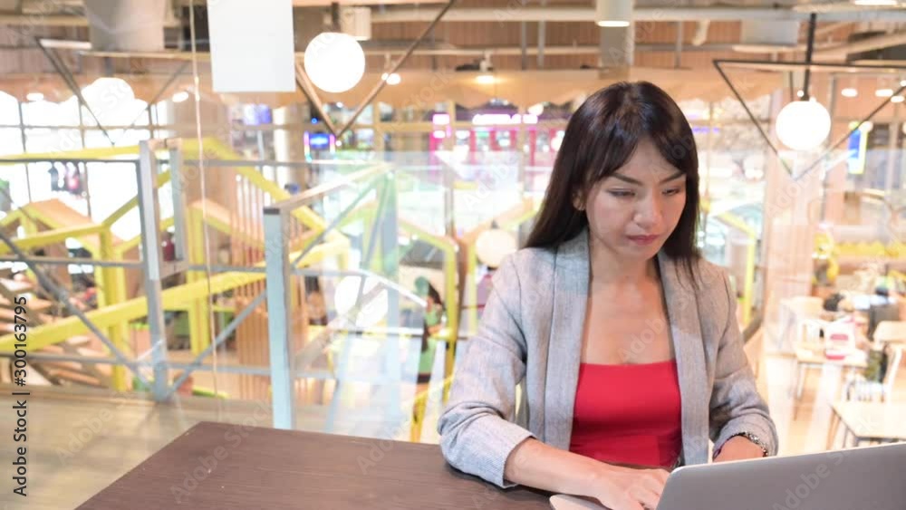 Entrepreneur woman working on laptop, typing keyboard computer wearing ...