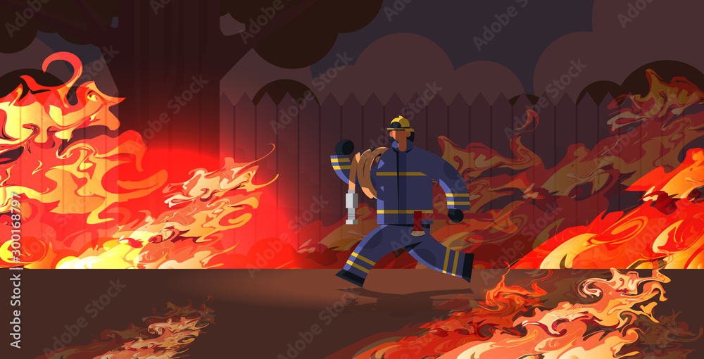 fireman carrying hose extinguishing flame in burning house backyard ...
