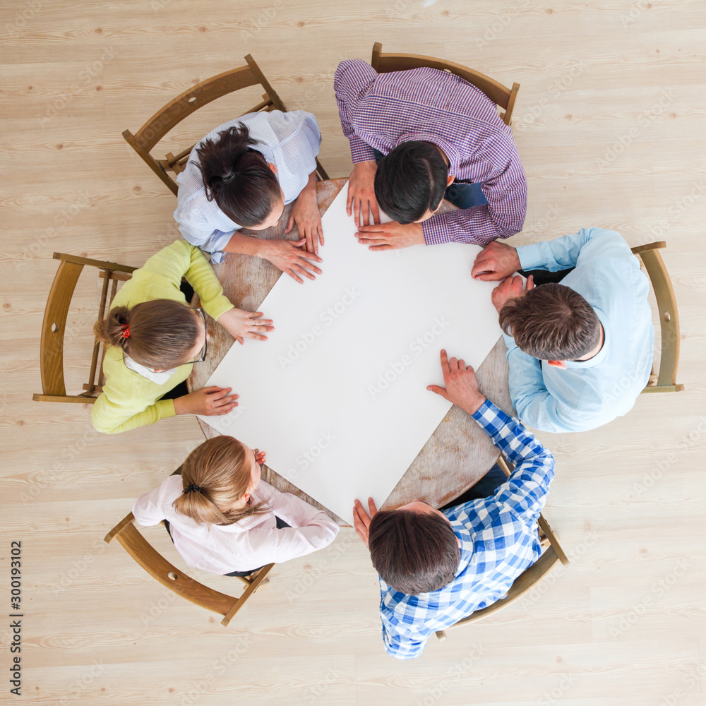 People team pointing to white paper Stock Photo | Adobe Stock