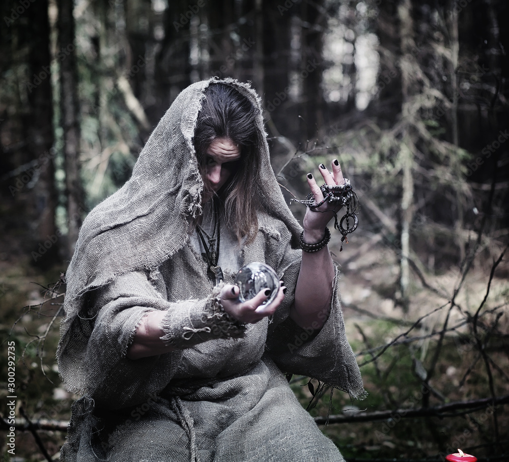 Fairy magician. A sorcerer with a glass sphere, a magical spell and a ...