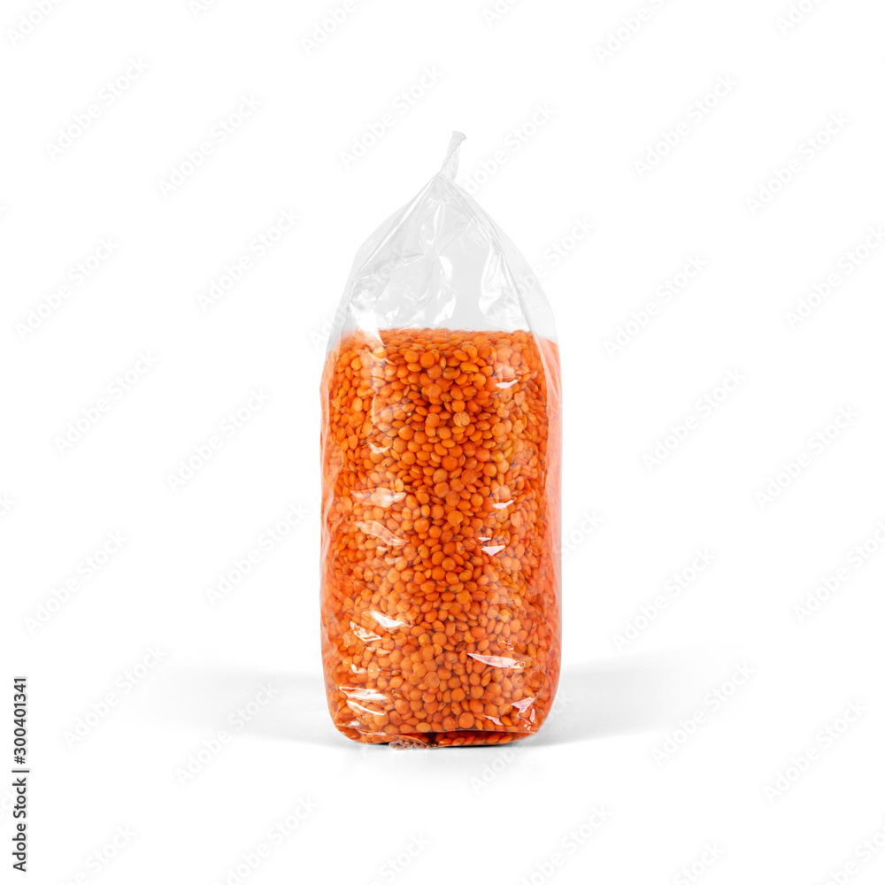 Red Lentils in transparent plastic bag isolated on white background ...