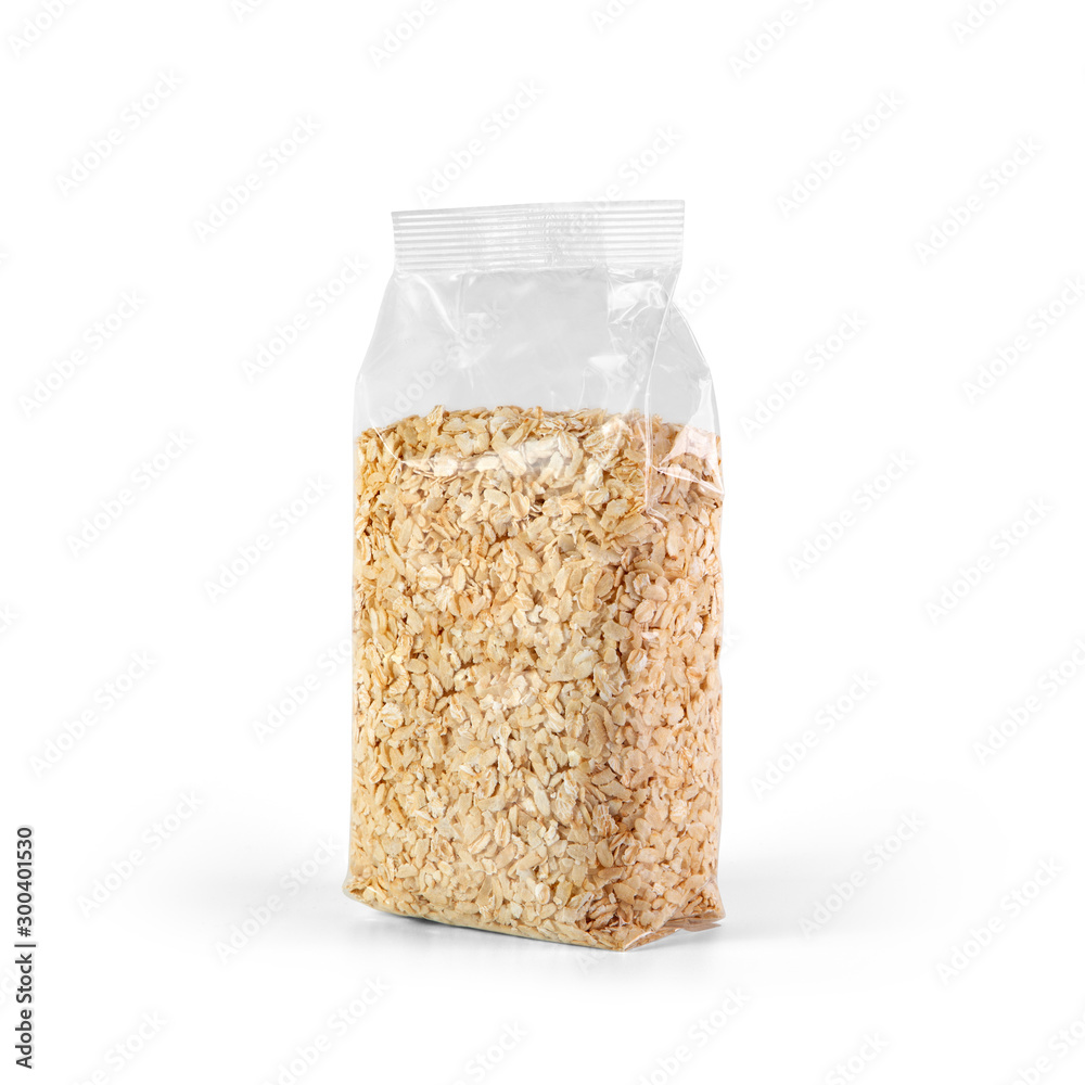 Oat flakes in transparent plastic bag isolated on white background ...