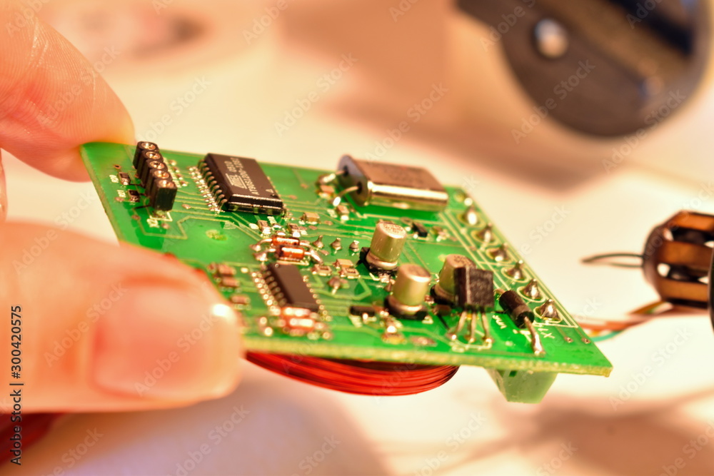 Repairing a microchip detail. Wiring diagram from computer technology ...