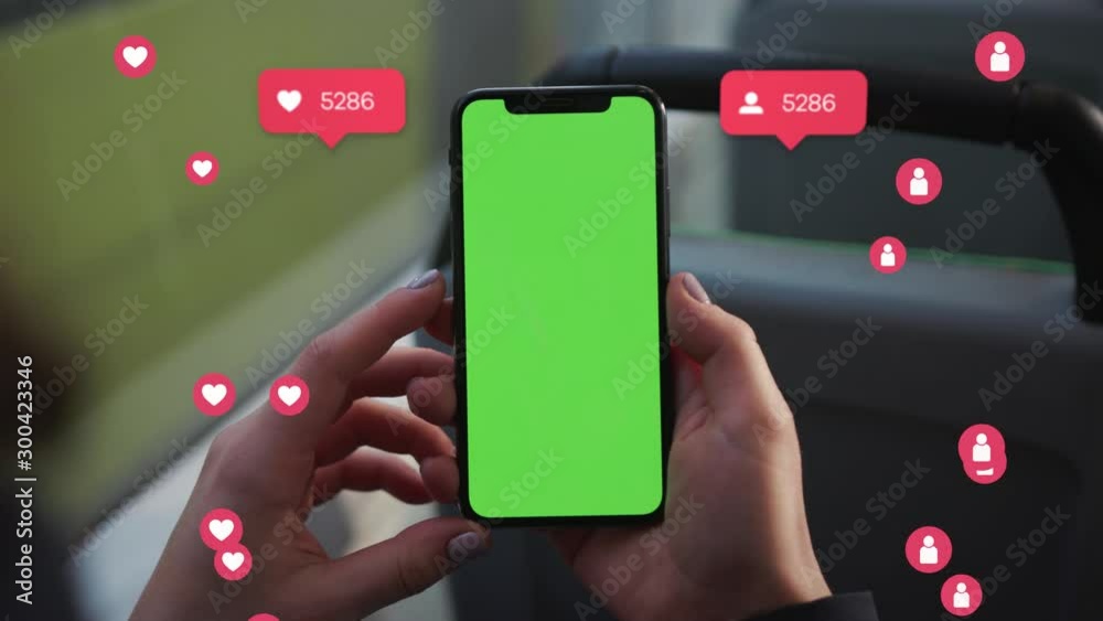 Close up of a woman's hand holding a mobile telephone with a vertical ...