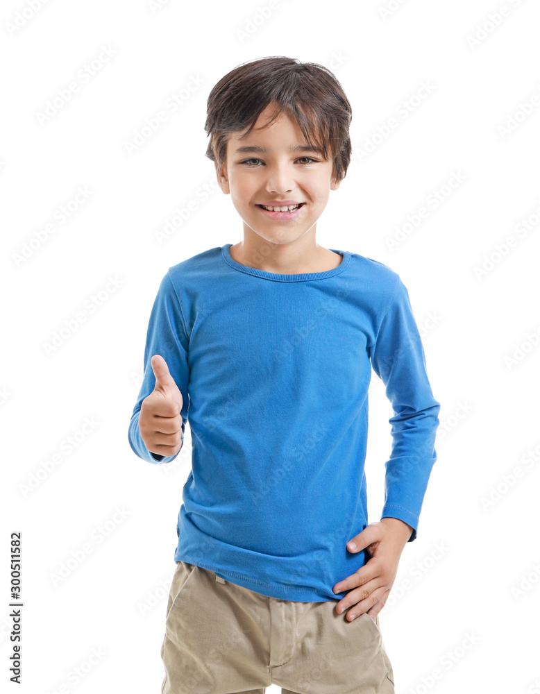 Cute little boy showing thumb-up gesture on white background Stock ...