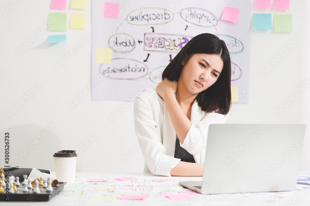 Office syndrome concept. Beautiful young asian businesswoman with ...