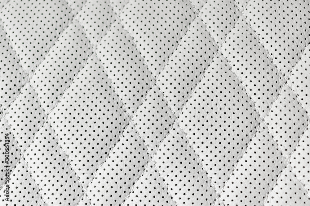 Modern luxury Car white leather interior. Part of perforated leather ...