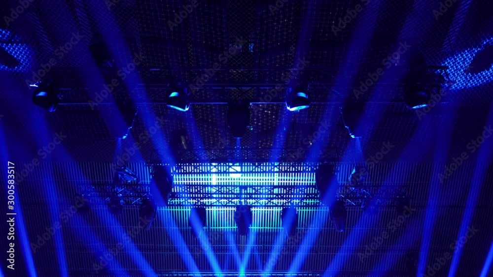 Ramp with lighting equipment. Blue spotlights on steel construction ...