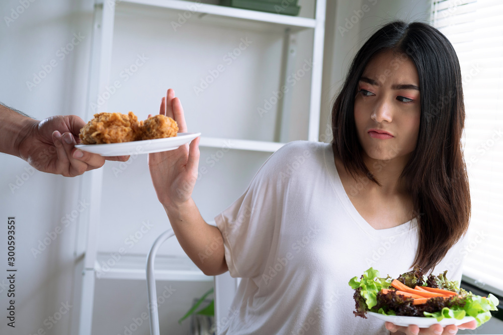 Dieting health concept, young woman rejecting Junk food and choosing ...