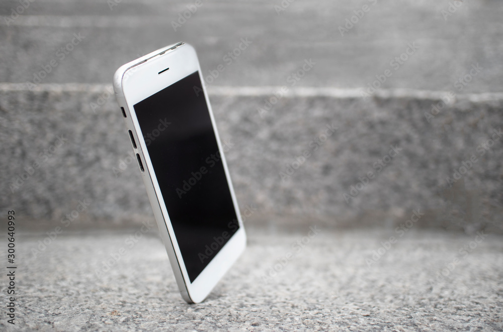 Mobile cell phone falls from hands and crashes on stairs, on asphalt ...