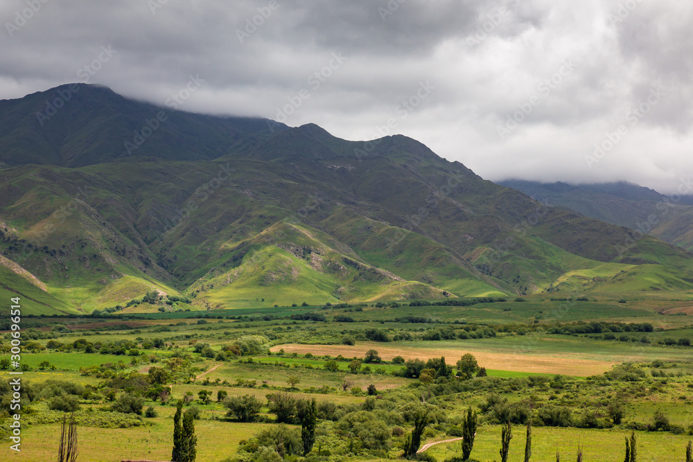 Panoramica de cerros con nubes bajas Stock Photo | Adobe Stock