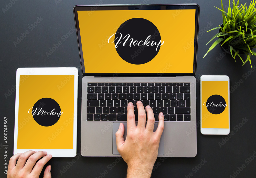 Tablet Laptop and Mobile Mockup on Desk with Hands Stock Template ...