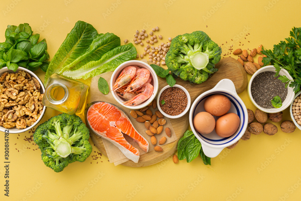 Omega 3 food sources and omega 6 on yellow background top view. Foods ...