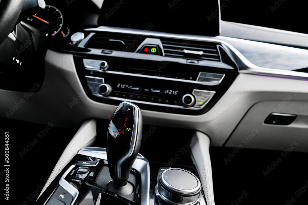 Automatic gear stick of a modern car. Modern car interior details ...