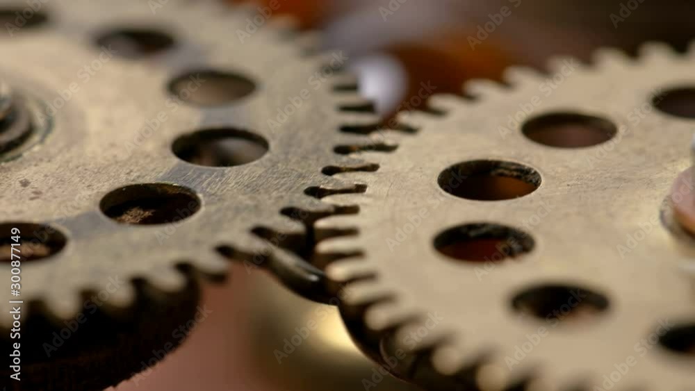 close-up spinning gears, Very similar to a clock mechanism or a working ...