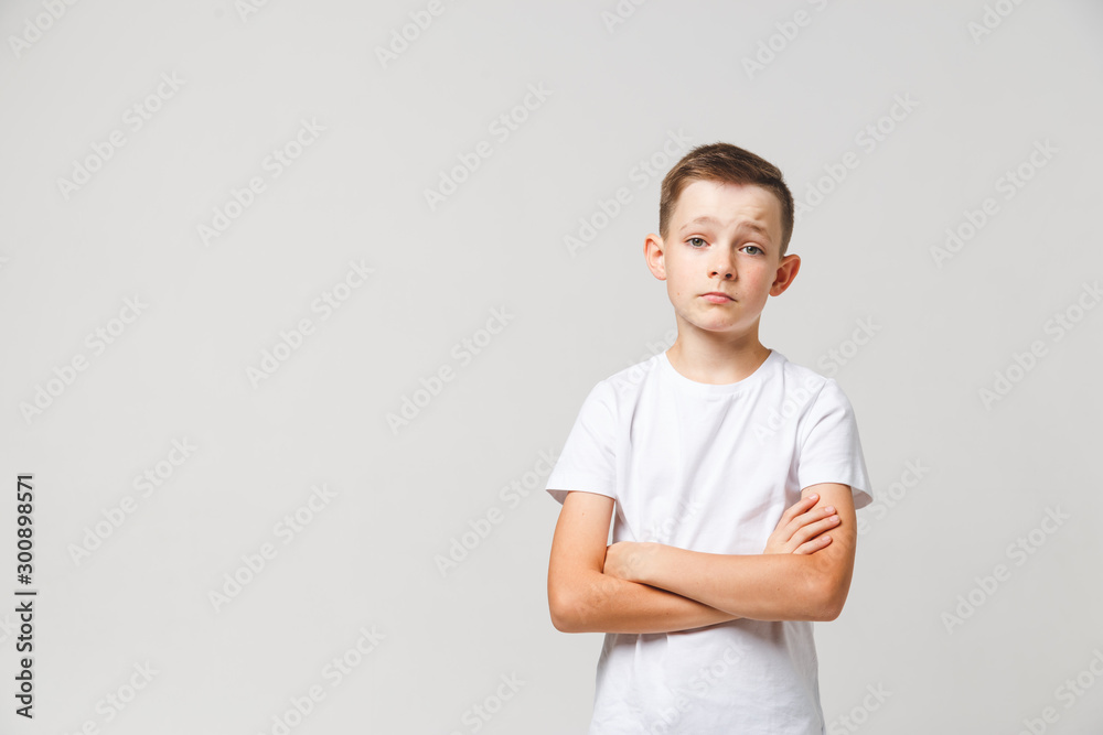 Sad young boy portrait on white background with copyspace Stock Photo ...