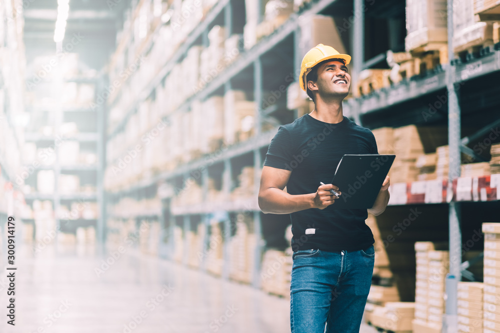 Smart Indian engineer man worker wearing safety helmet doing ...