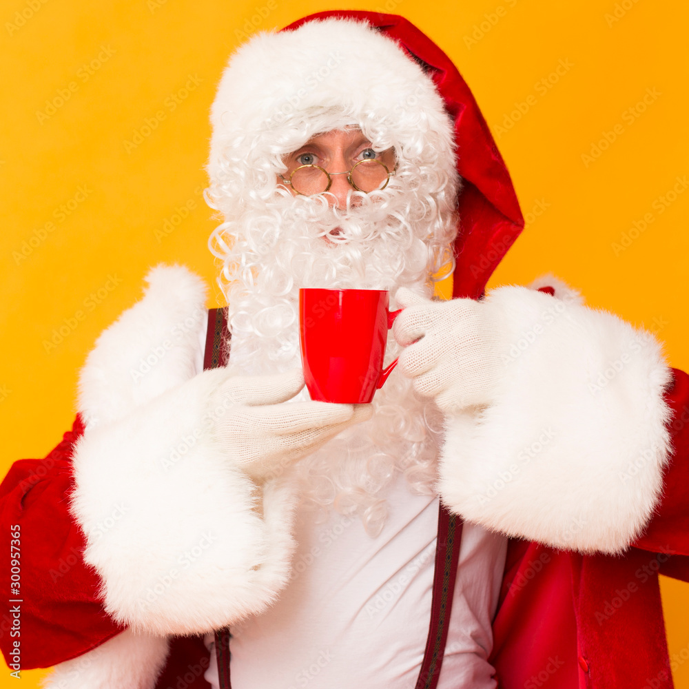 Handsome Santa Claus drinking hot coffee and sniffing flavor Stock ...