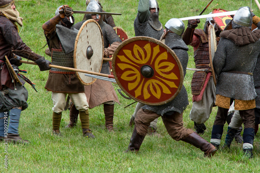 Fighting knights of the middle ages. Battle on the hill. Days of Live ...