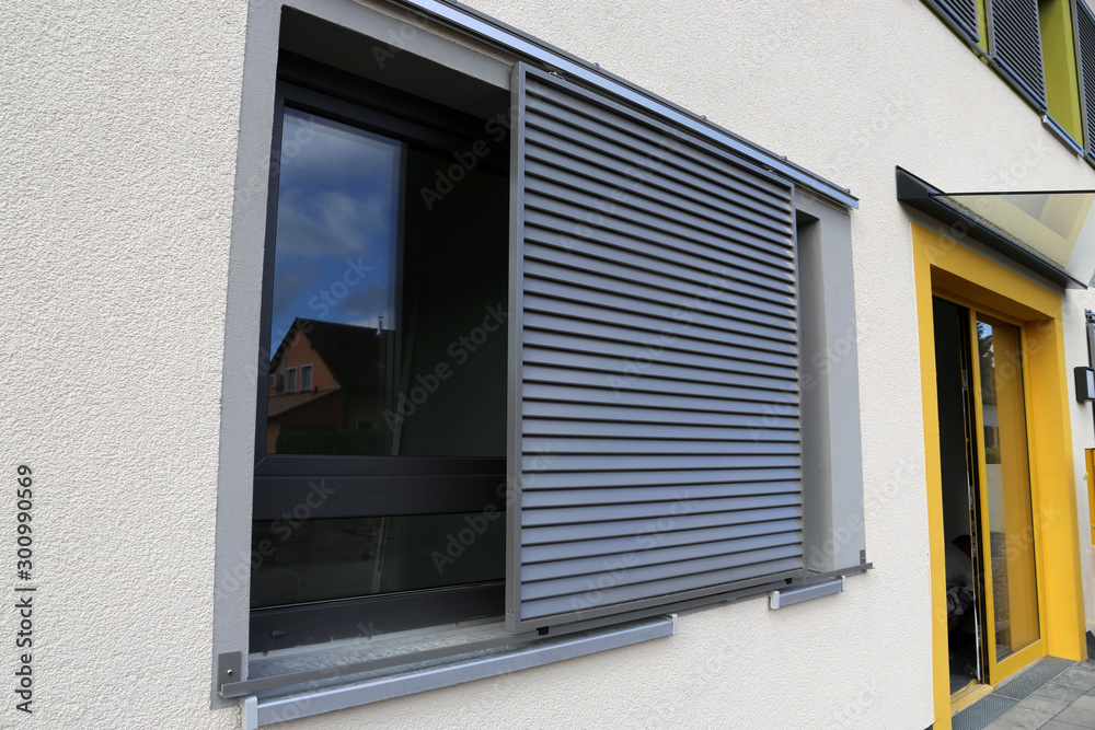 Fenster mit modernen Schiebeläden Stock Photo | Adobe Stock