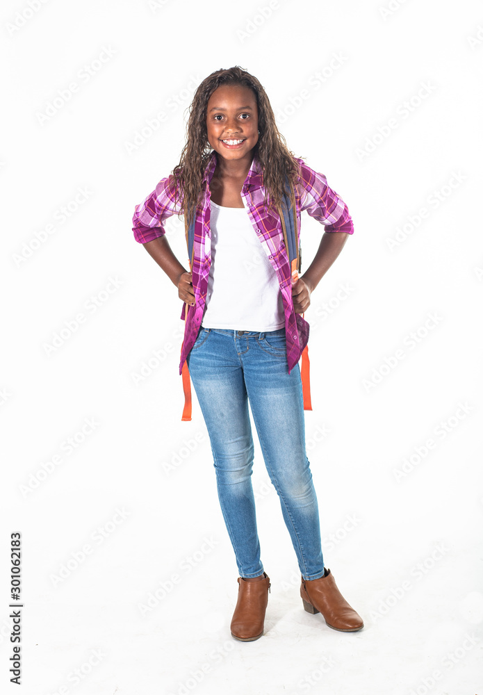 Smiling African American school girl isolated on white background ...