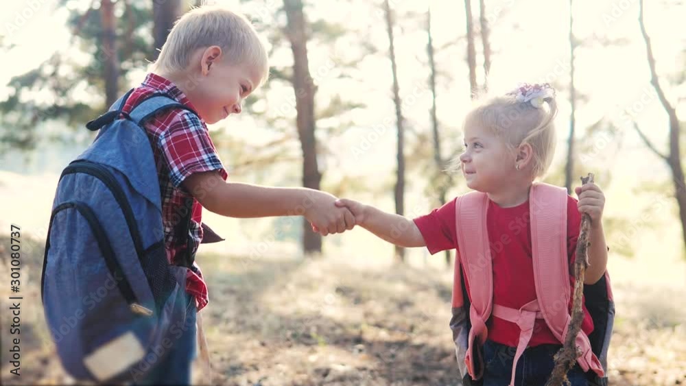 happy family little boy and girl tourists teamwork handshake scouts ...