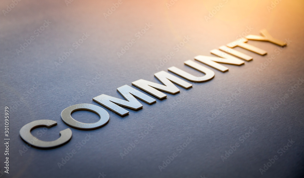 Word community written with white solid letters Stock Photo | Adobe Stock
