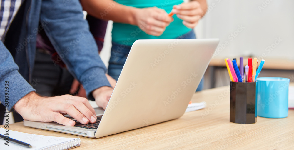 Developer writes on a laptop computer Stock Photo | Adobe Stock