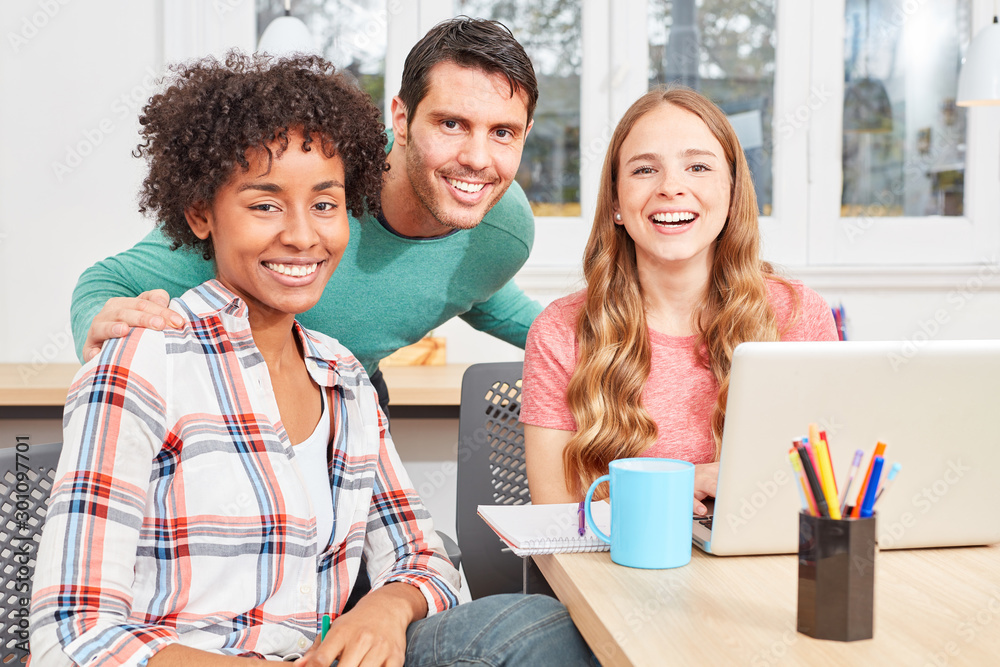 Creative startup team with laptop is having fun Stock Photo | Adobe Stock