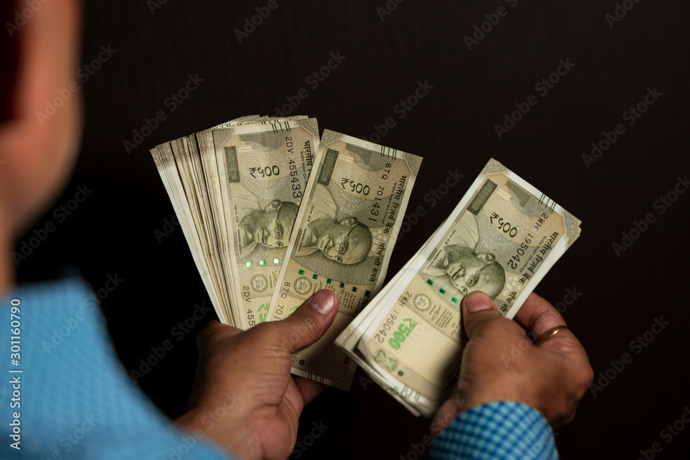 Indian Male Counting Cash Of Indian Five Hundred Rupees. A person is ...
