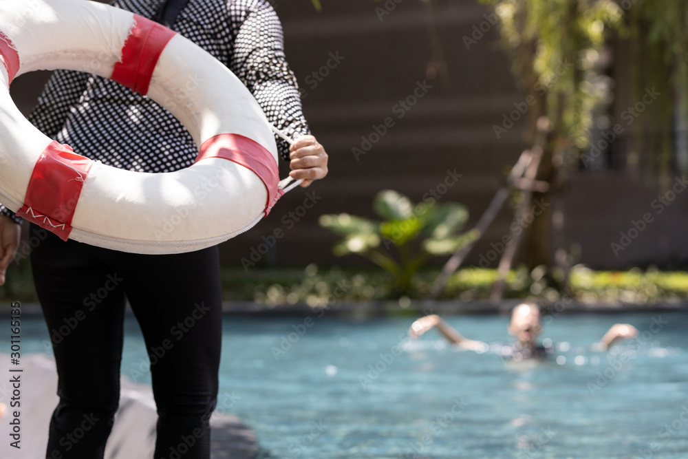 Person hand holding ringbuoy to rescue drowning in dangerous situation ...