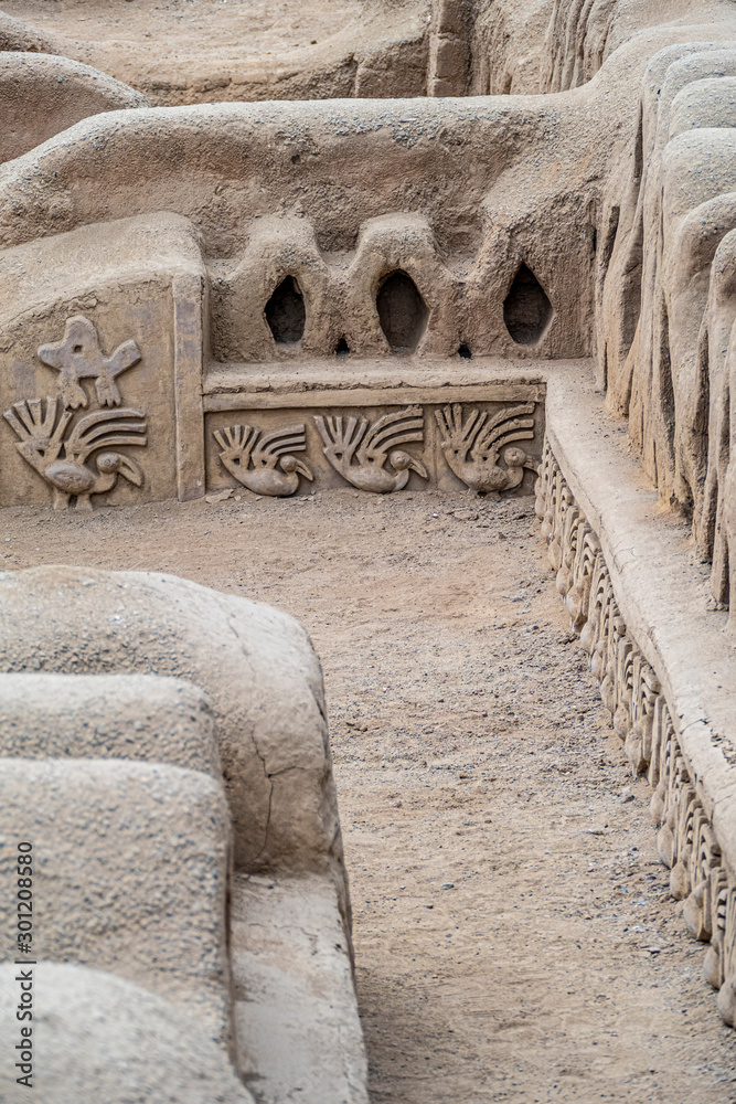 adobe walls and decorations in the archaeological site of Chan Chan ...