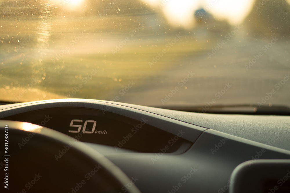 The dashboard of the car with a speed of 50 km / h on the speedometer ...
