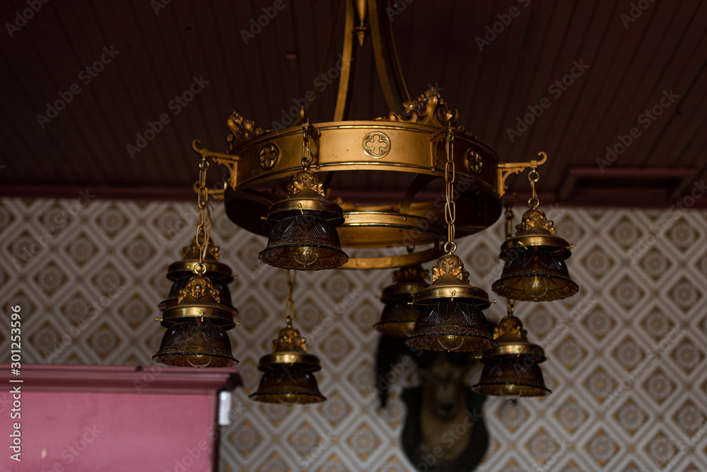 Old fashioned vintage kerosene oil lantern lamp burning with a soft ...